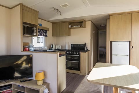 Caravan with decking at Coopers Beach Holiday Park ref 49012CW | Mersea ...