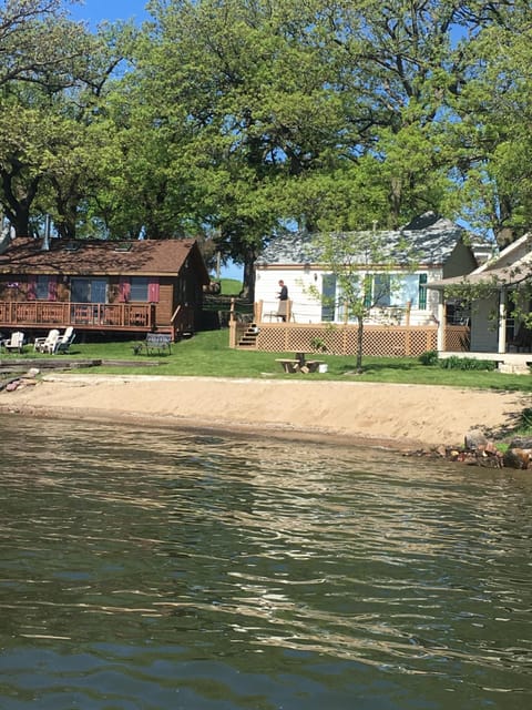 Prime East Lake beachfront cabin with boat hoist in Okoboji | Okoboji ...