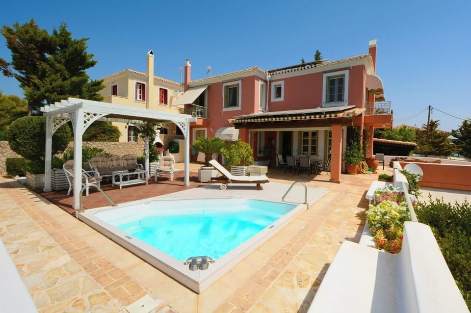 Charming, waterfront, sea view, 3-bedroom villa in the heart of Aghios ...